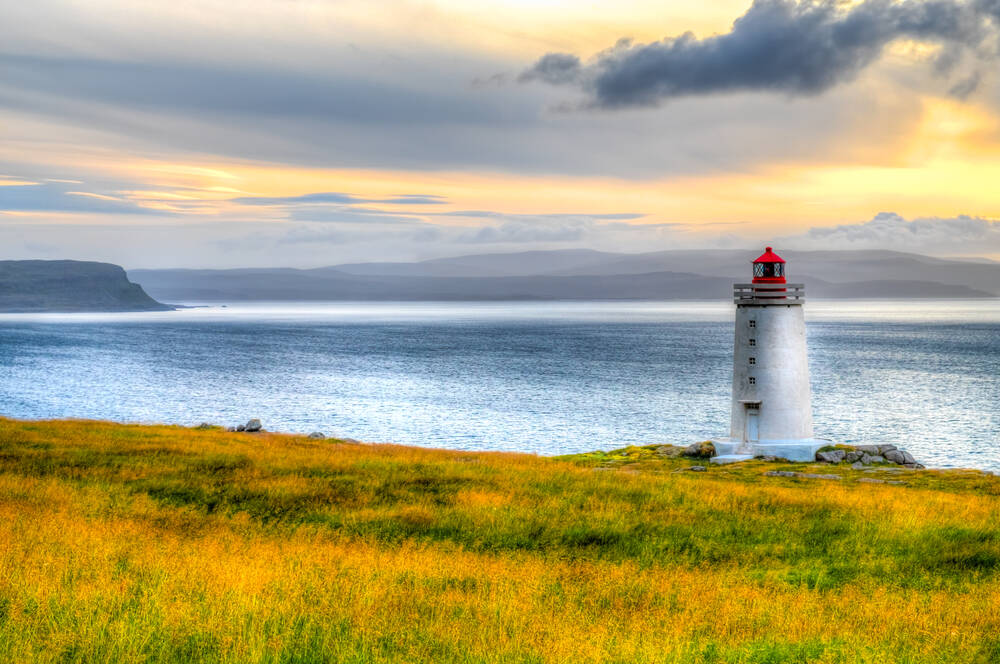Lighthouse on the Arctic Ocean Iceland - Photographic print for sale