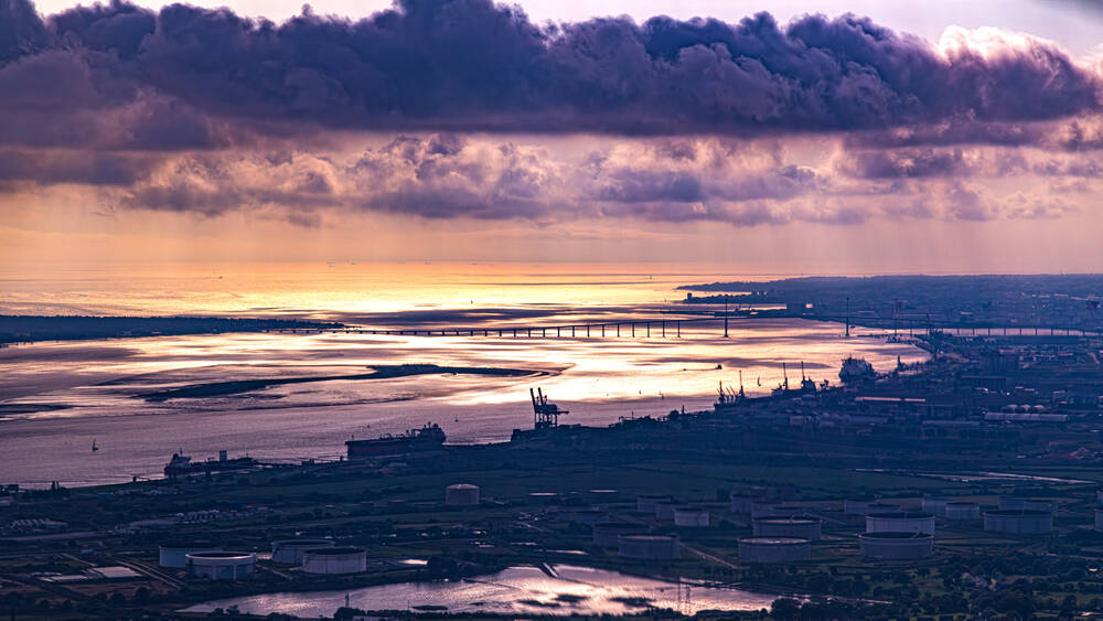 Sunset over the Donges refinery in the Loire estuary - Photographic ...