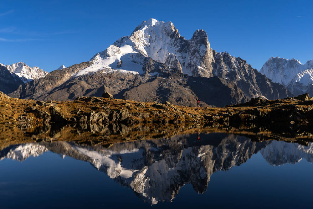 A hike between Aiguille Verte and Aiguille Rouge at Lac des Cheserys ...