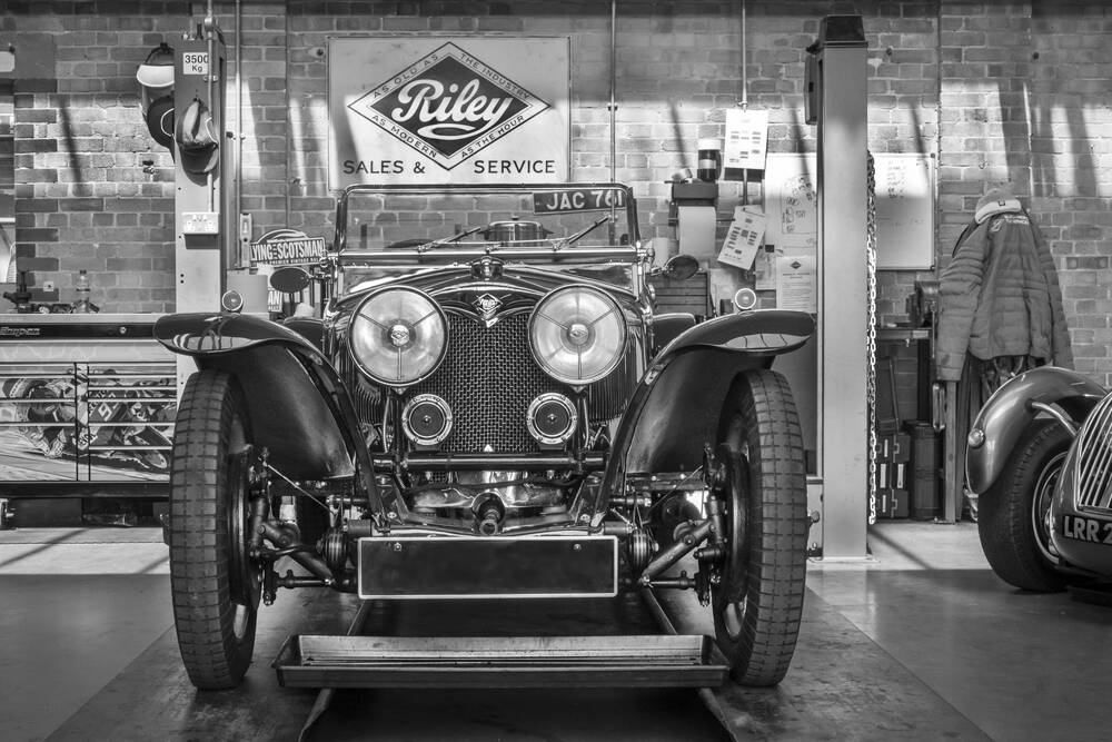 Vintage Riley sports car in a workshop - Photographic print for sale