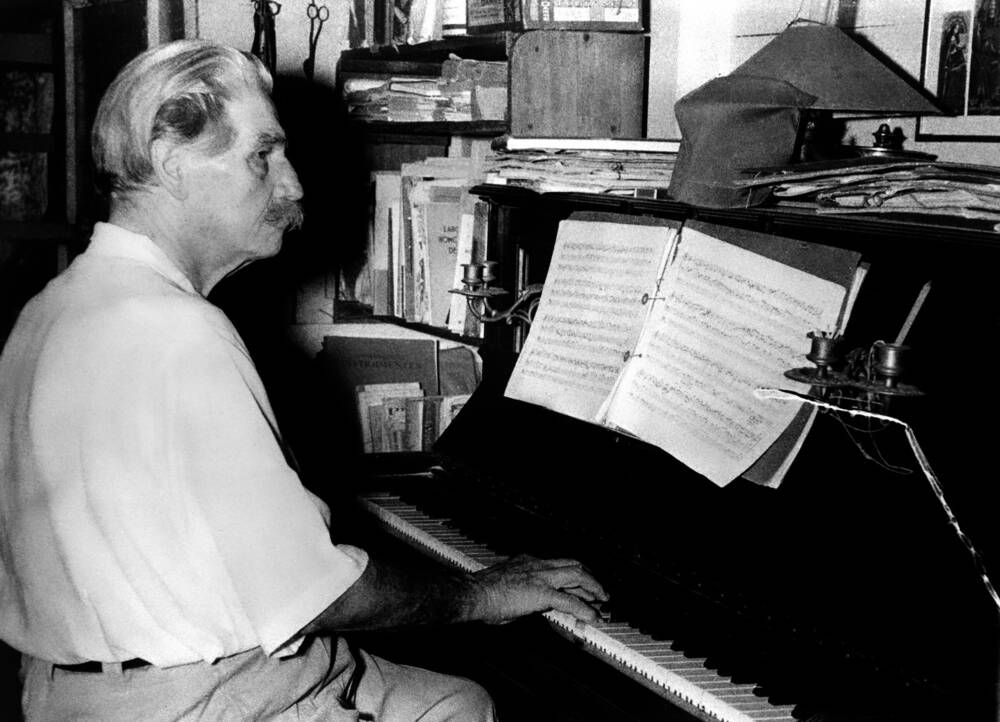 Albert Schweitzer playing the piano in 1956 - Photographic print for sale