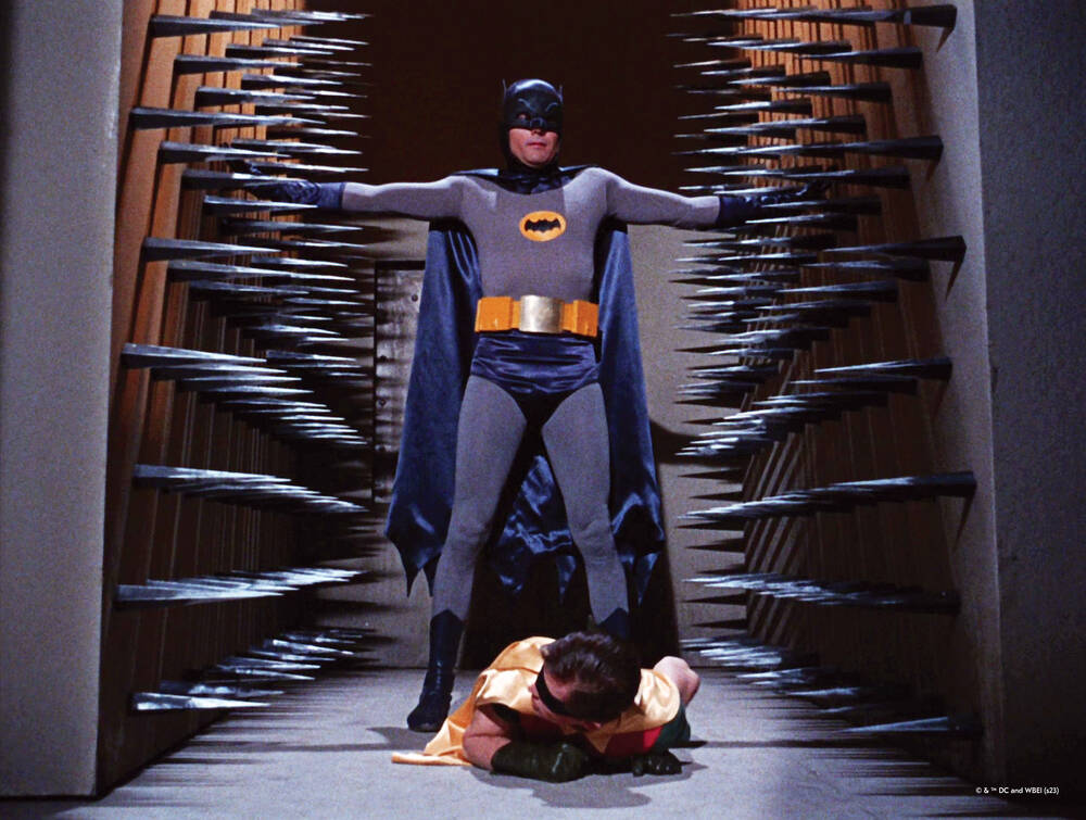 Batman trying to protect himself and Robin - Photographic print for sale